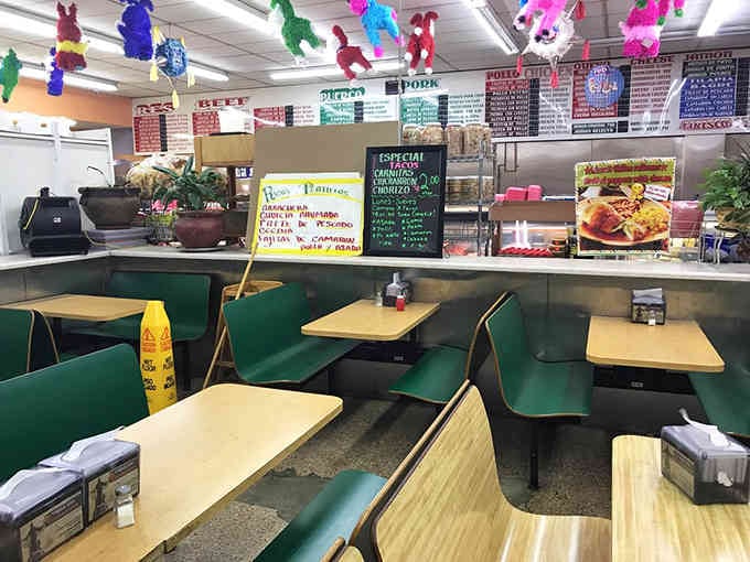 Wooden booths lined with local history create the perfect setting for enjoying a meal that tastes like a warm hug.