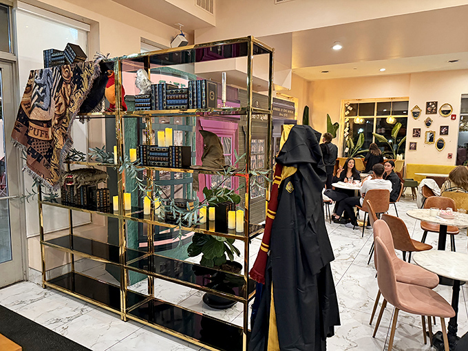 This bookshelf isn't just decor &ndash; it's a personality statement, complete with Harry Potter robes suggesting the pastry magic might be actual wizardry.