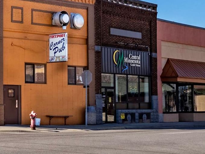 Downtown Freeport features classic small-town storefronts including the Corner Pub, where locals gather for legendary tater tot hotdish and conversation.