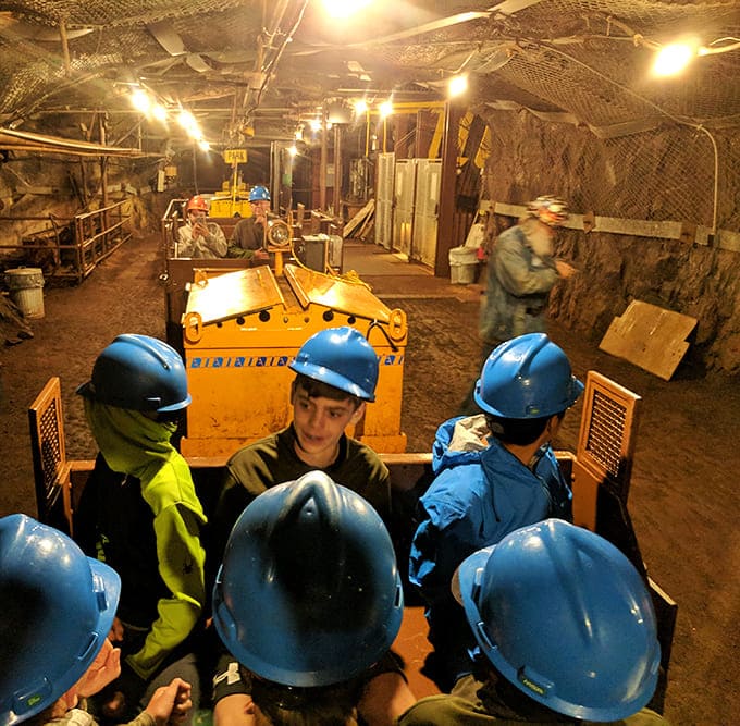 All aboard! The authentic mine train carries modern adventurers through tunnels once filled with the sounds of drills and dynamite.
