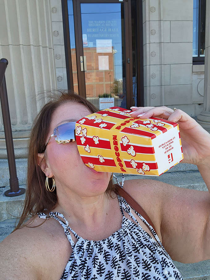 The ultimate taste test! Outside the museum, visitors can sample the star attraction, proving that popcorn appreciation is a hands-on (and mouth-watering) experience.