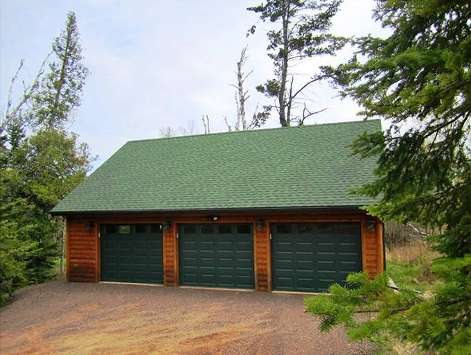 Even the garage got the full North Woods treatment, because in Minnesota, practical spaces deserve beauty too.