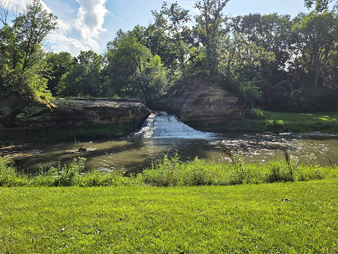 Rolling hills of green stretch toward the horizon, the kind of view that makes you pause mid-hike just to absorb it all.