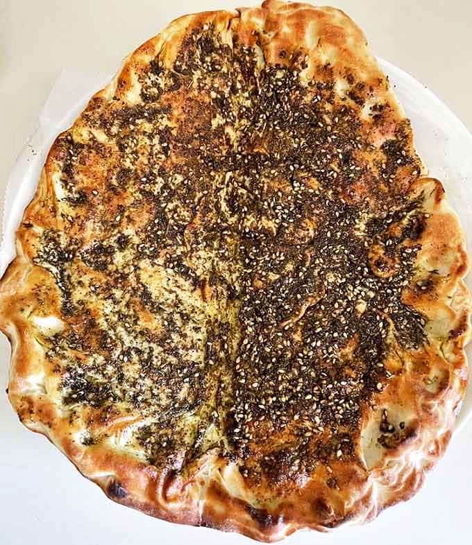 Za'atar manakeesh: aromatic, herb-covered flatbread that makes ordinary breakfast toast seem like a sad, neglected orphan.