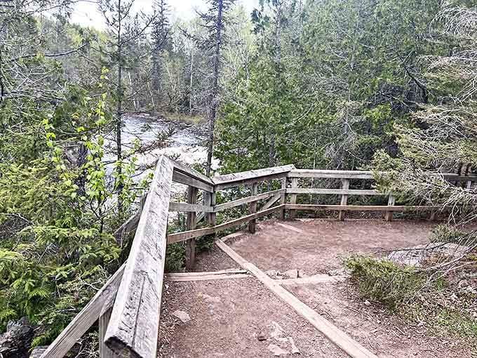 The thoughtfully constructed observation deck provides the perfect vantage point for safely experiencing the raw power of the cascading water.