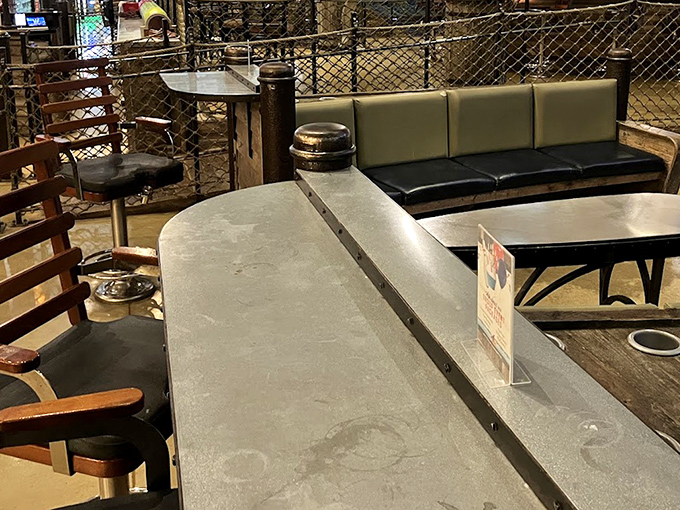 The dining area's rustic charm creates the perfect backdrop for family meals, with comfortable booths that feel like private dining cabins.