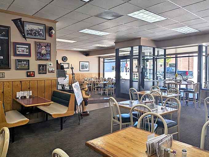 Another view of the dining area shows the sports memorabilia adorning the walls&mdash;this isn't just a cafe, it's a community hub.