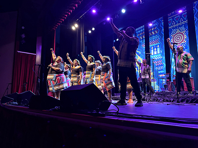 Performers raise their voices in harmony, the stage's perfect acoustics carrying every note to the furthest corners of the theater.