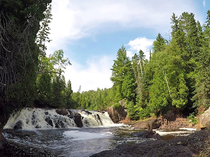 Where the river meets the rocks, creating nature's version of a spa treatment that's been perfecting its technique since the Ice Age.