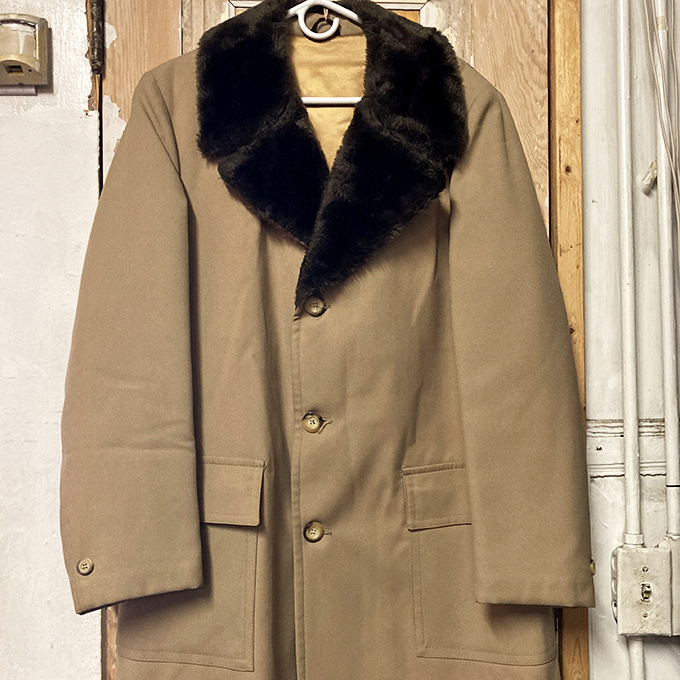 This distinguished overcoat with fur collar doesn't just keep you warm &ndash; it transforms any wearer into the protagonist of their own noir film.