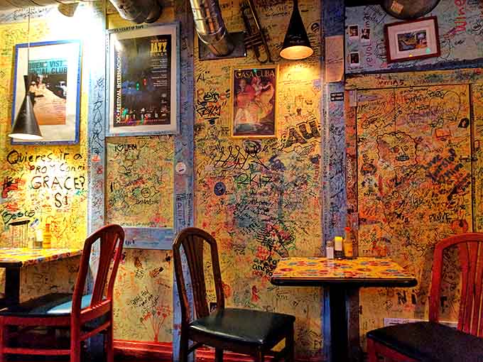 Every wall tells a story &ndash; or several thousand &ndash; as years of diners have left their mark, creating a living guestbook of Cuban food enthusiasts.