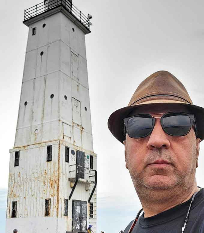 Visitor: A lighthouse enthusiast captures the perfect selfie, proving some structures were Instagram-worthy long before Instagram existed.