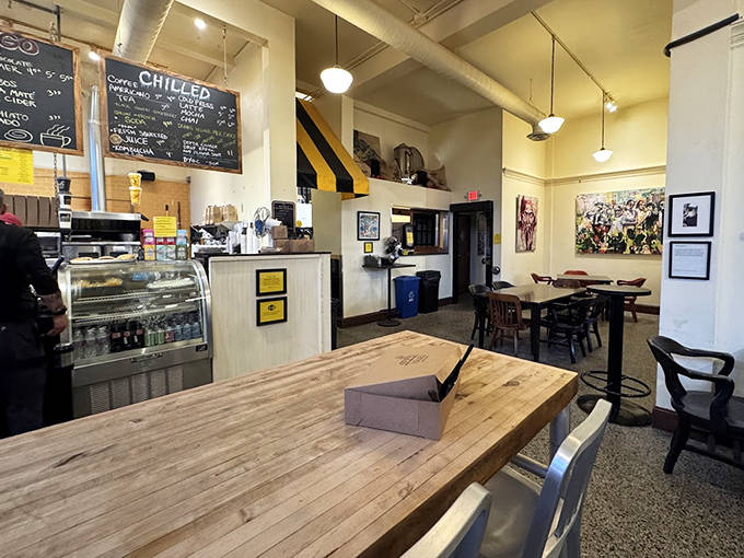 Simple wooden tables and chairs that have hosted countless coffee conversations and pastry-induced moments of pure joy.