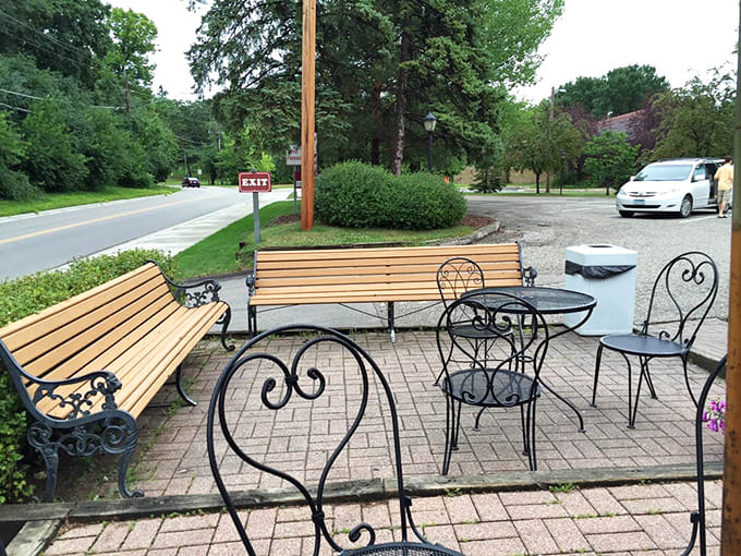 Outdoor seating with flower boxes and benches invites you to slow down and savor every spoonful of frozen bliss.