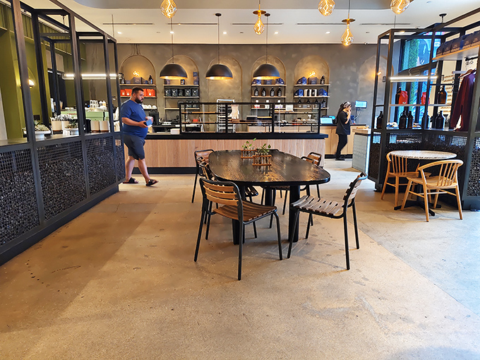 The thoughtful design extends throughout the space &ndash; modern pendant lights illuminate comfortable seating areas perfect for Miami's creative crowd.