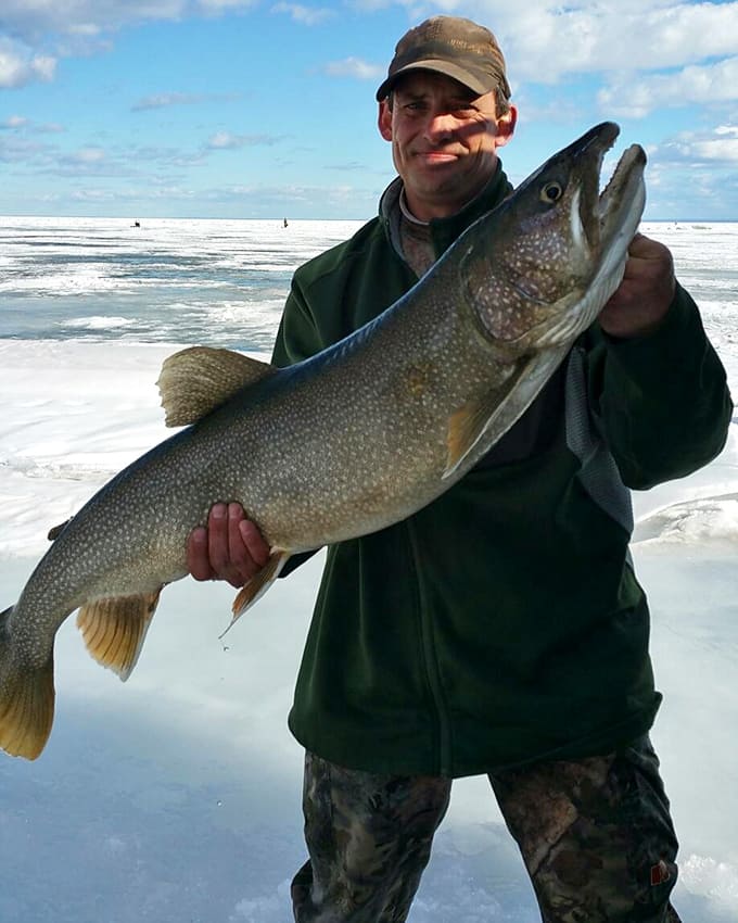 Ice fishing yields impressive rewards for patient anglers &ndash; Lake Superior's cold depths harbor trophy-sized lake trout and more.