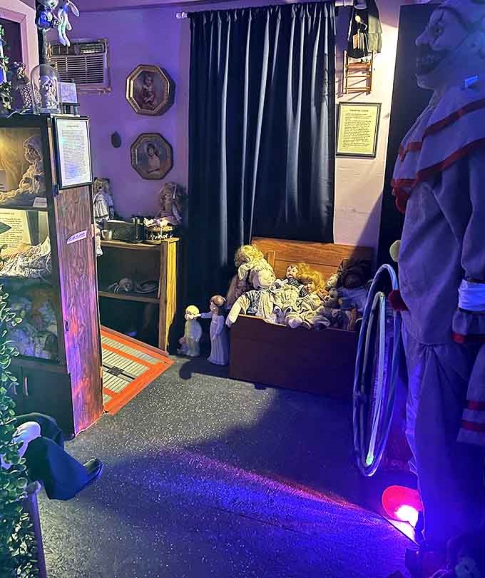 The doll room glows with eerie purple light, creating shadows that seem to move when you're not looking directly at them.