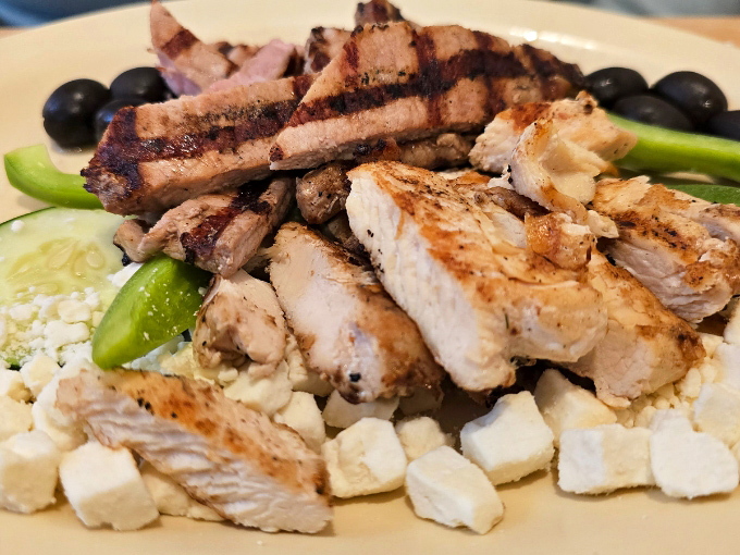 A protein-packed salad that doesn't sacrifice flavor for virtue – grilled chicken and fresh vegetables creating a harmony that fast food can only dream about.