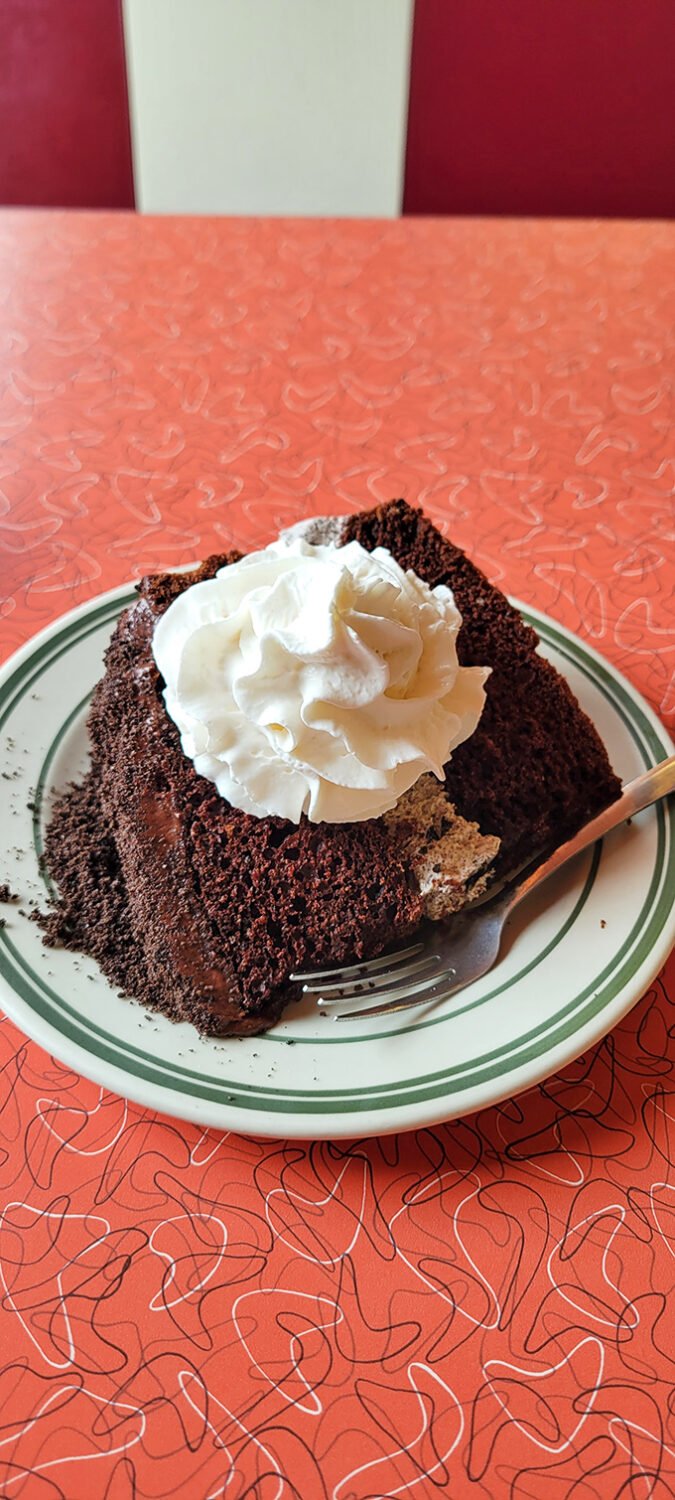 This chocolate cake doesn't just satisfy a sweet tooth &ndash; it creates a momentary chocolate-induced amnesia where calories cease to exist.