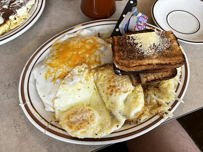 Classic breakfast done right &ndash; perfectly cooked eggs, golden hash browns, and toast that's actually worthy of your attention.