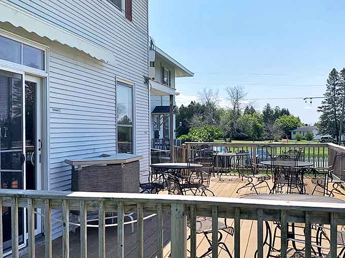 The spacious back deck offers a perfect retreat for afternoon relaxation or evening conversations under Michigan's star-filled skies.