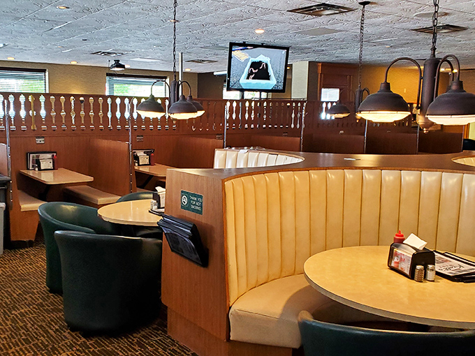 
Dining Area Comfortable booths designed for serious eating business, with wood paneling that's witnessed countless "Oh my god, you have to try this" moments.
