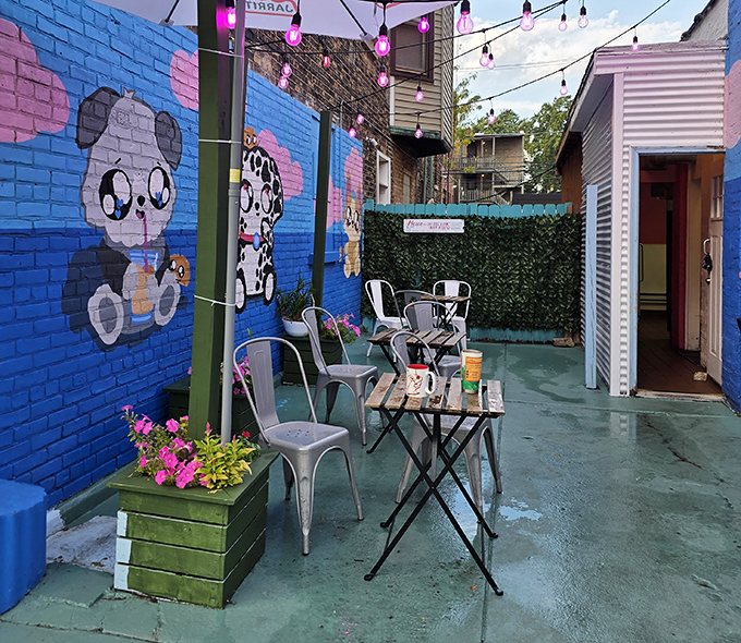 Outdoor bliss &ndash; the patio area features whimsical panda murals, string lights, and just enough seating to create an intimate urban oasis.