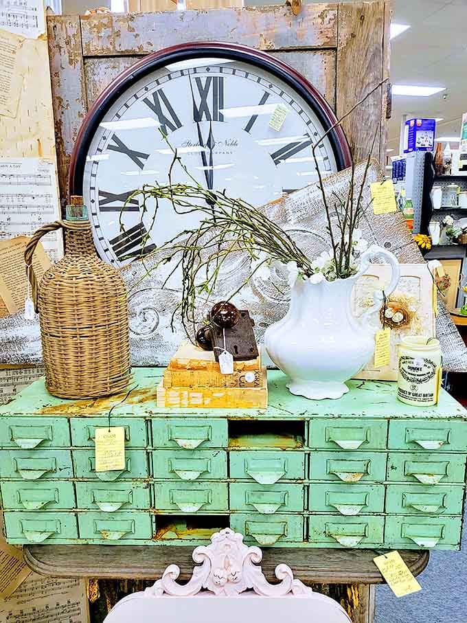 That mint-green cabinet with weathered charm wasn't distressed by a designer but by decades of hands opening drawers in search of necessities.