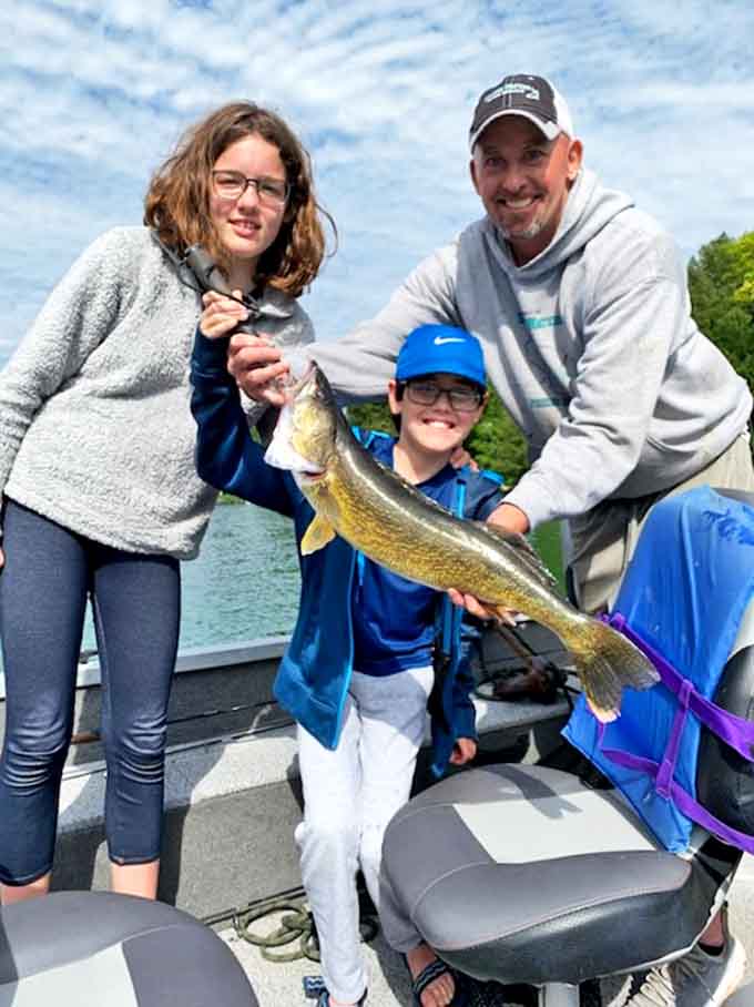 Fishing success brings smiles all around, proving that patience and the right spot can land you dinner and bragging rights.
