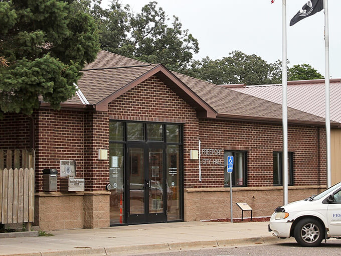 The brick Freeport City Hall represents the town's commitment to preserving its heritage while moving forward, much like its famous water tower.