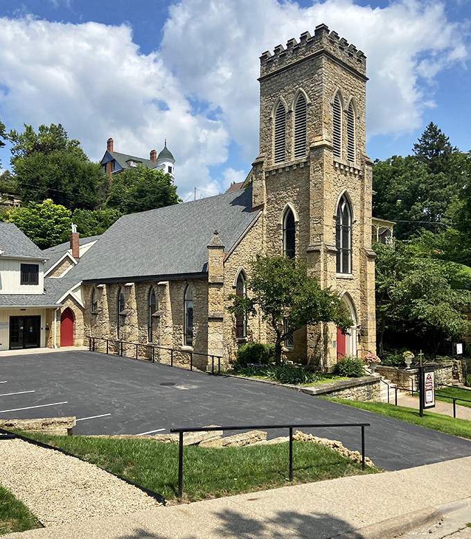 Grace Episcopal Church's stone tower reaches skyward, its Gothic architecture a spiritual anchor in Galena's historic landscape.