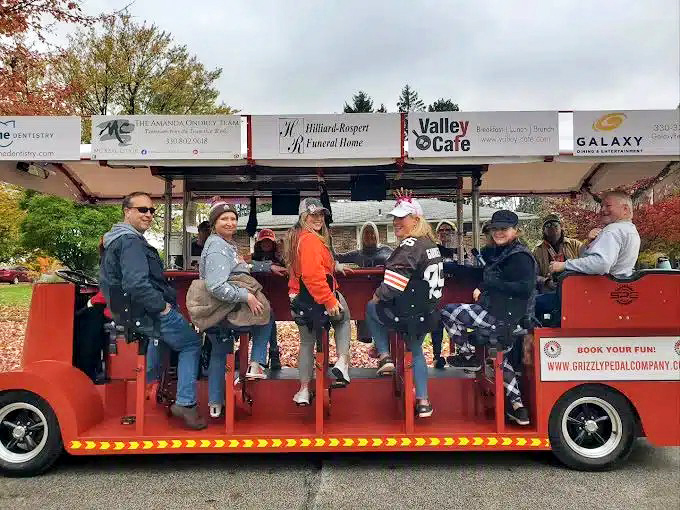 The Grizzly Pedal Company turns sightseeing into a group sport – part transportation, part workout, all fun as riders pedal through Medina's streets.