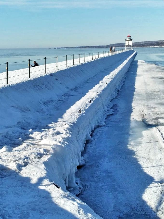Winter transforms the breakwater into a surreal ice kingdom, where brave visitors are rewarded with scenes straight from a frozen fairy tale.