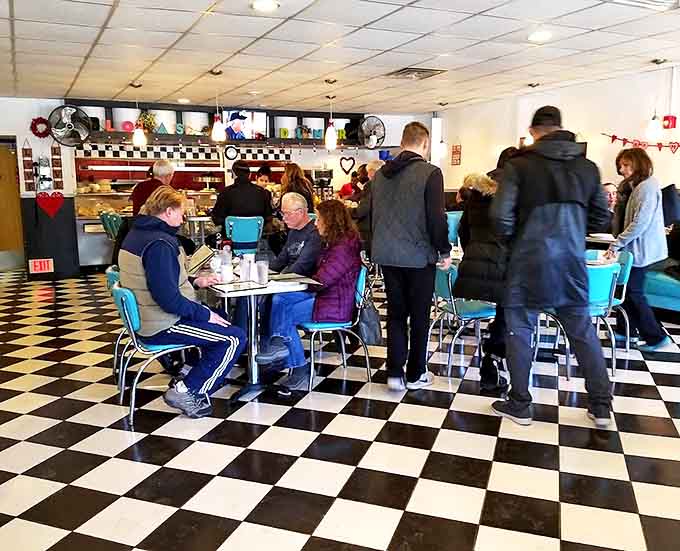 Weekend mornings bring a bustling crowd of regulars and newcomers alike, all drawn by the promise of comfort food and nostalgic charm.