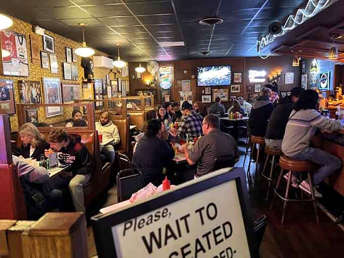 The crowd is always a mix: locals, tourists, families, and solo diners, all united by their love of molten cheese.