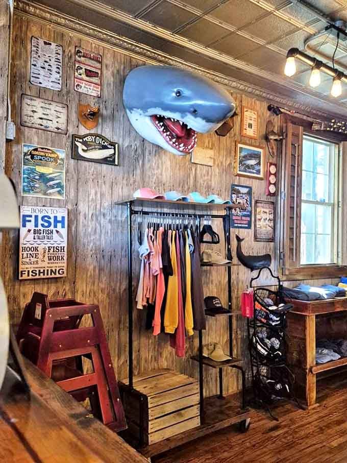 Even the merchandise corner embraces the fishing theme &ndash; a shark head watches over casual apparel that lets you take a bite of Marine City style home.