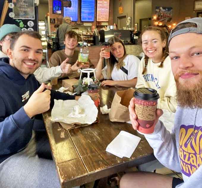 Happy customers gathered around good food and great coffee, which is basically the definition of community done right in small-town Michigan.