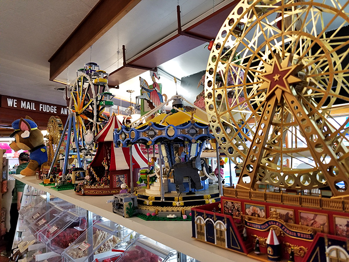 Miniature carnival displays add whimsy to the sugar experience &ndash; tiny mechanical marvels that hypnotize children while parents' wallets recover.