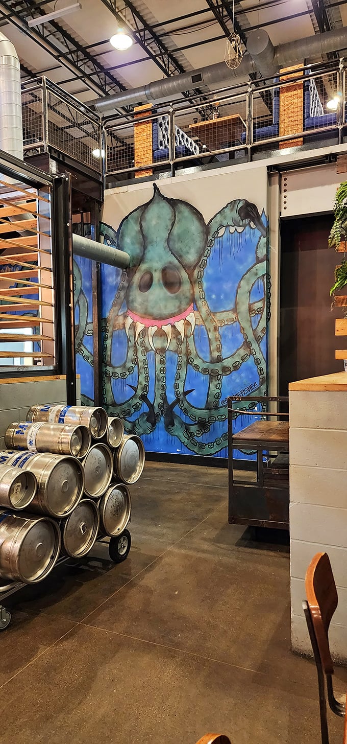 The massive octopus mural watches over brewing operations, adding whimsical charm to the serious business of making exceptional beer.