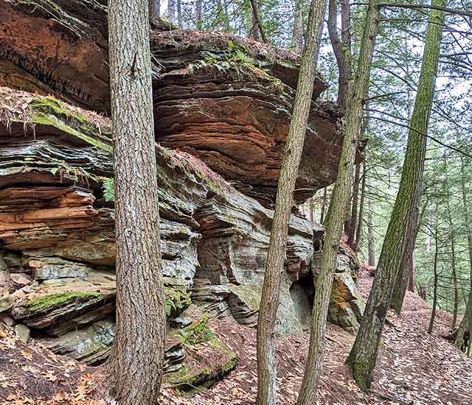 Ancient rock layers stacked like geological pancakes, each one representing thousands of years of Earth's patient artistry.
