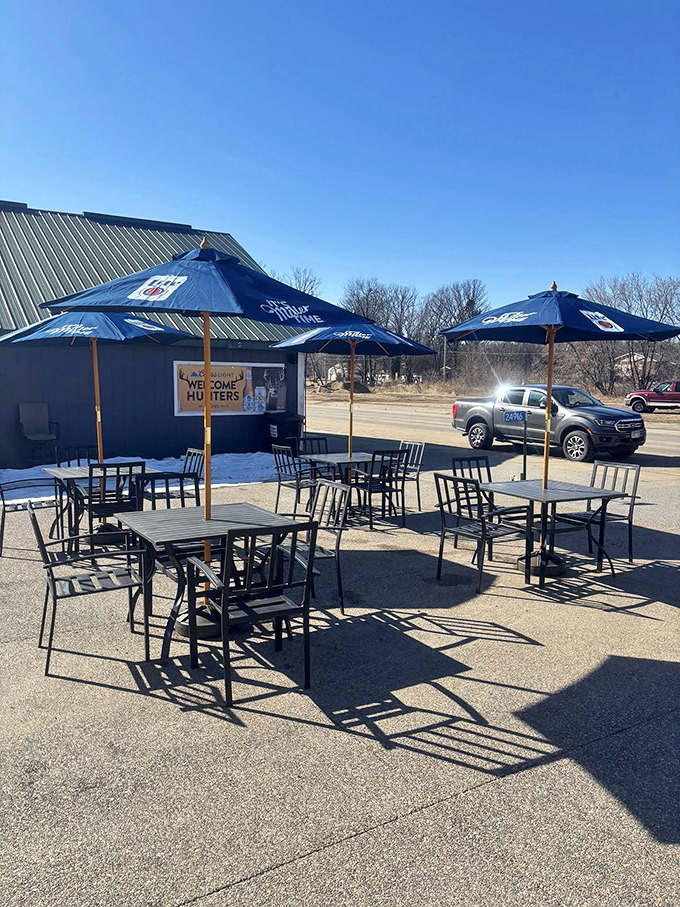 The outdoor patio offers a perfect summer spot for enjoying cold drinks under Minnesota's famously blue skies.
