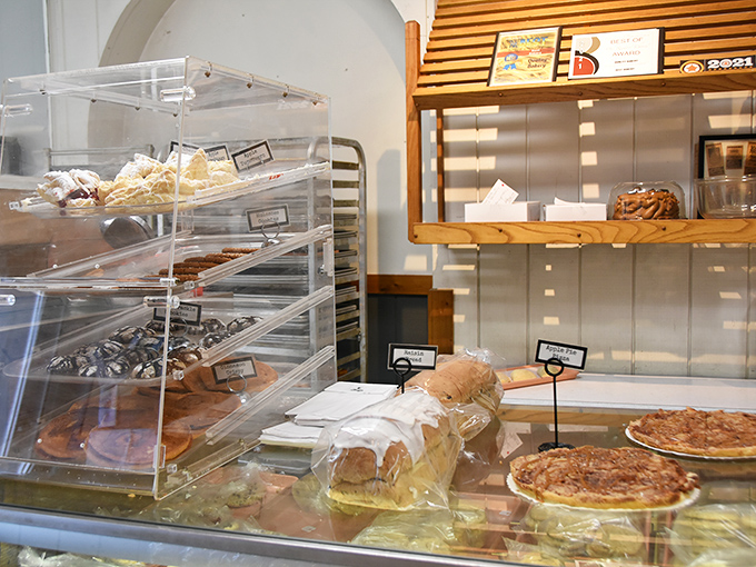 The window display offers a preview of the treasures within, tempting passersby with golden-fried perfection.