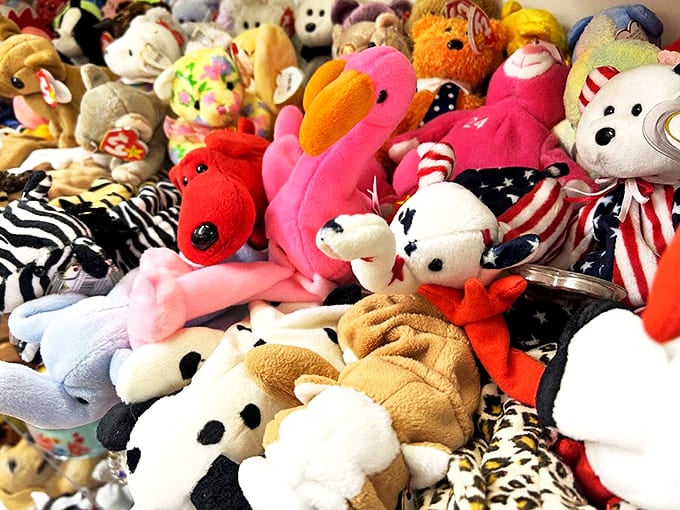 A mountain of plush companions waits for new hugs – that pink flamingo might become someone's cherished childhood friend starting today.