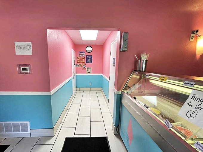 Even the hallway to the restrooms continues the diner's perfect pink and blue palette, proving that at The Comet, no detail is too small.