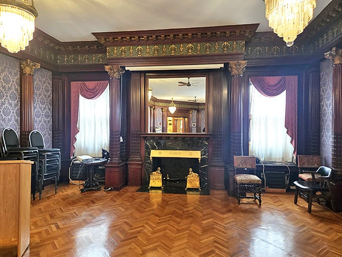 Rich wood paneling and period details create an atmosphere where you half-expect to find a secret passage behind the bookcase.