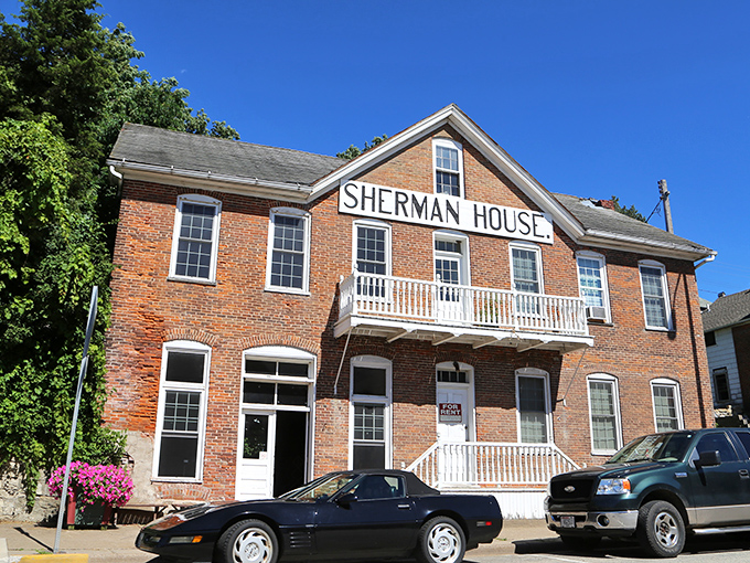 The Sherman House stands proudly on Main Street, its brick facade weathered by time but still welcoming visitors.