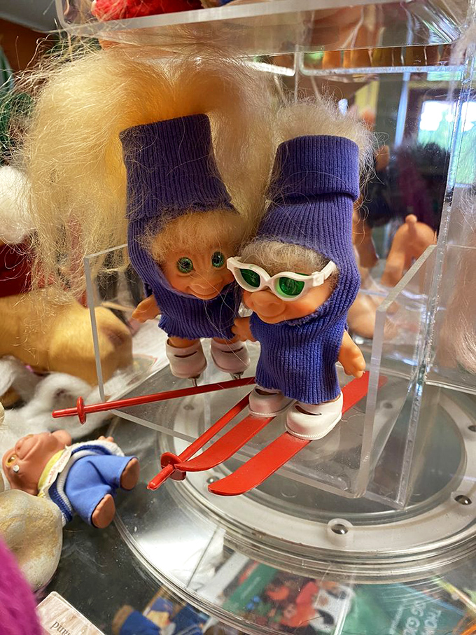 Even on tiny skis, these trolls look more coordinated than most of us on actual slopes.