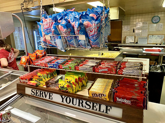 The candy counter offers a rainbow of temptations, with classic movie treats arranged in mouthwatering display.