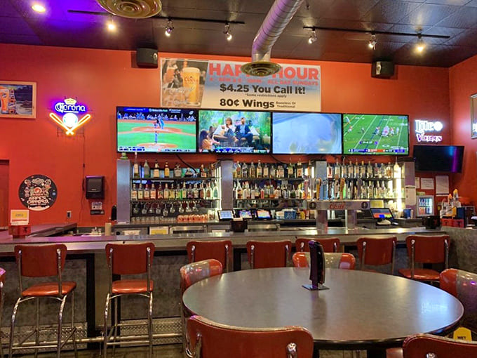 A welcome oasis for adults, where sports games play on multiple screens and cold beverages flow like meteor showers during happy hour specials.