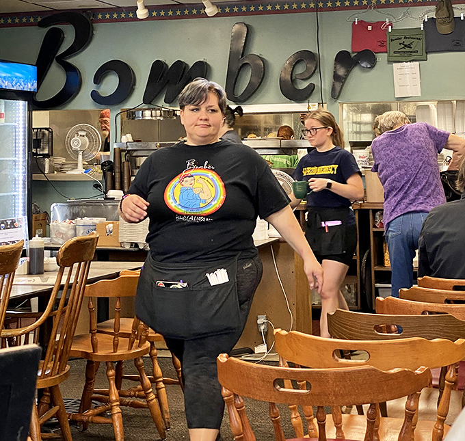 The walls tell stories of victory and sacrifice &ndash; newspaper headlines and memorabilia creating a living museum around your meal.